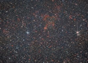 地球から150万光年、不規則銀河NGC 6822の塵に隠された星々をウェッブ望遠鏡がとらえた | アストロピクス